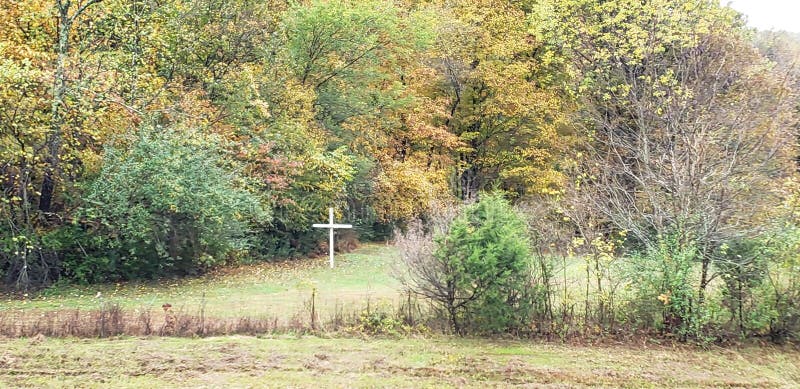Cross in fall trees stock photo. Image of colorful, trees - 163107896