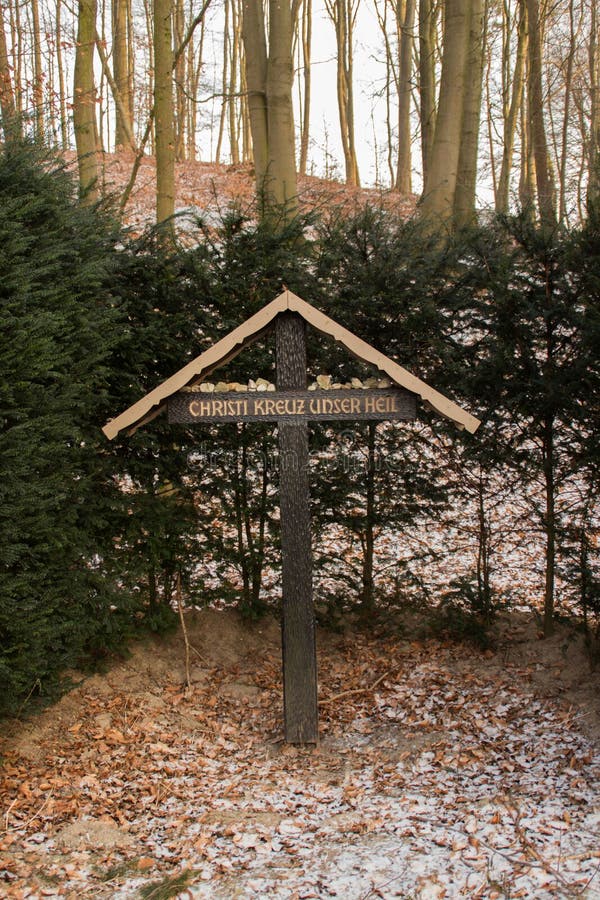 A cross in a forest stock photo. Image of germany, catholic - 111658682