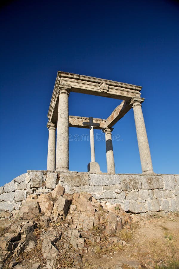 Cross between four columns stock photo. Image of avila - 17903054