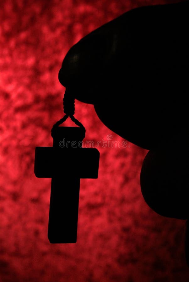 Cross in hand stock image. Image of supported, black - 28735395