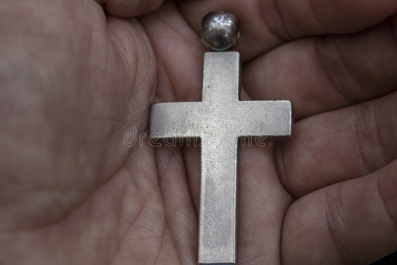 Cross in hand. stock image. Image of charity, hands - 223512217