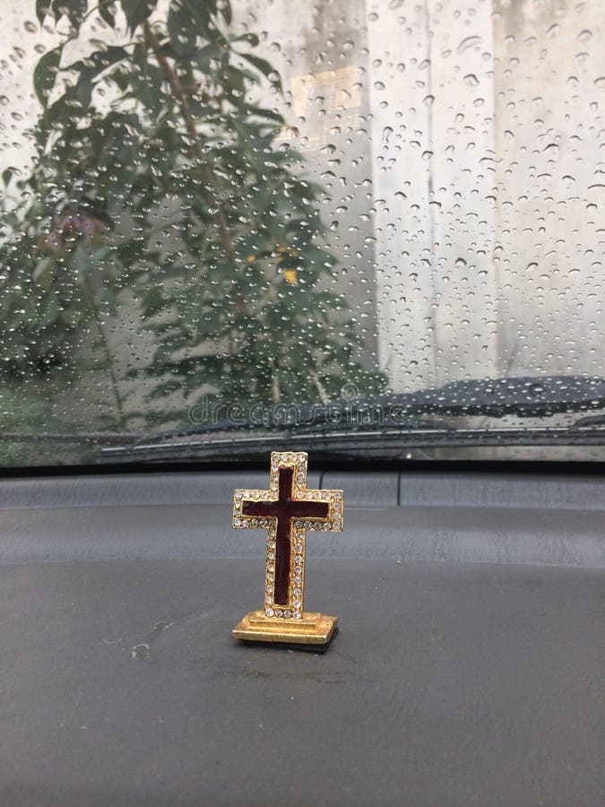 Cross inside car stock image. Image of cross, raindrops - 111544897