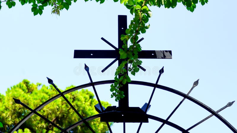 The Cross and Ivy on the Iron Gate Stock Photo - Image of garden ...