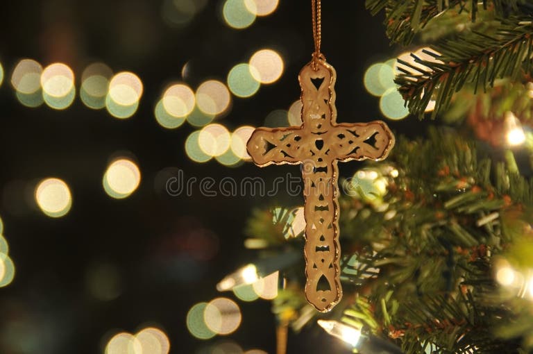 Cross Ornament on Christmas Tree Stock Image - Image of christ, night ...