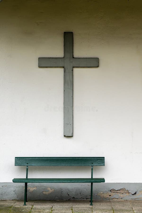 A cross over a bench stock image. Image of germany, culture - 306176187