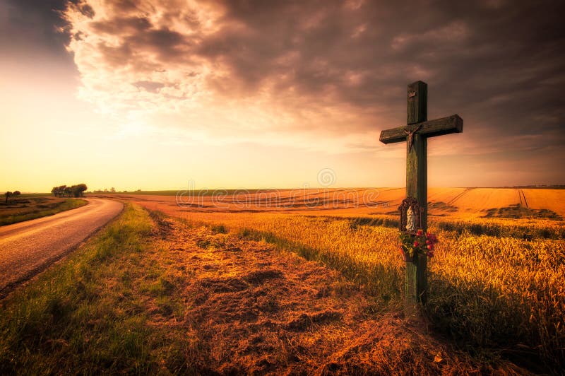 Cross Over the Field during Sunset Stock Photo - Image of clear, crop ...