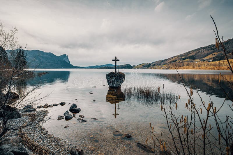 Cross on Rock in Lake Mond Surrounded Mountains Stock Photo - Image of ...