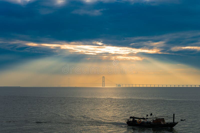 A Cross-sea Bridge Under the Rays of the Rising Sun Stock Image - Image ...