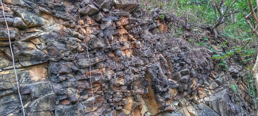The Cross-section of the Rocks that Make Up the Cliff Looks Sturdy and ...