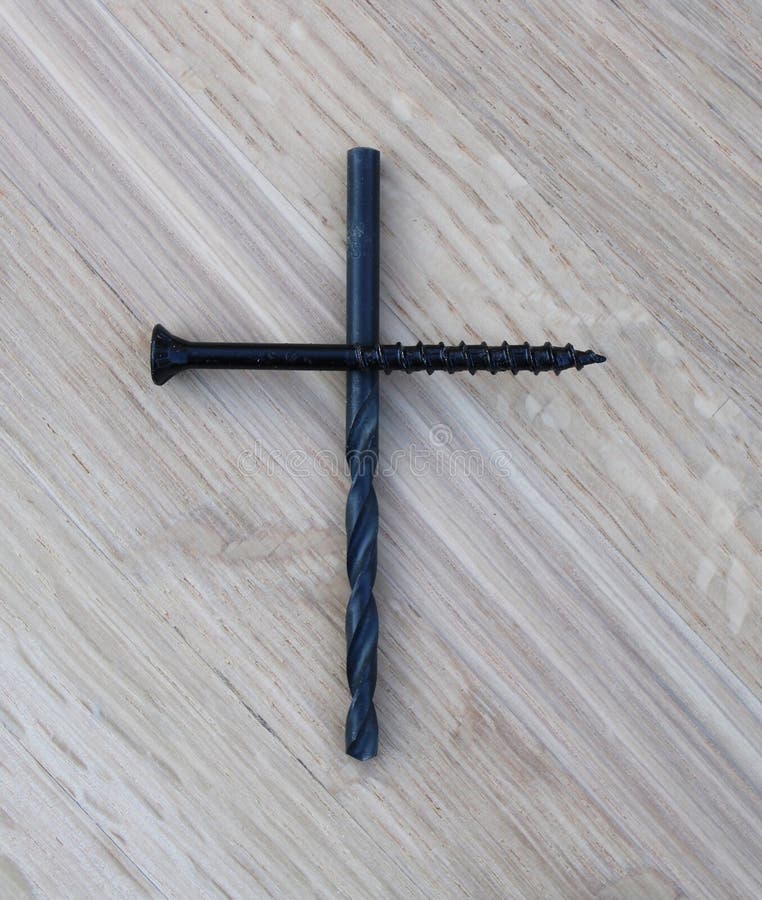 A Cross Shape Made from a Construction and a Drill Bit Stock Image ...