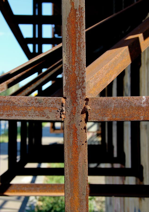 A Cross Shaped Metal Construct Made of Rusty Angle Sections Connected ...