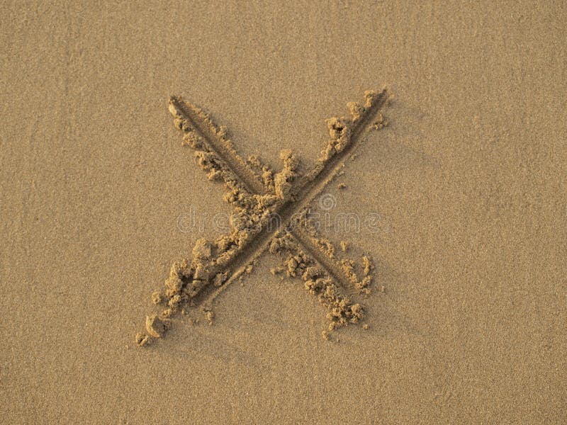 Cross sign drawn on sand stock photo. Image of conceptual - 21744974