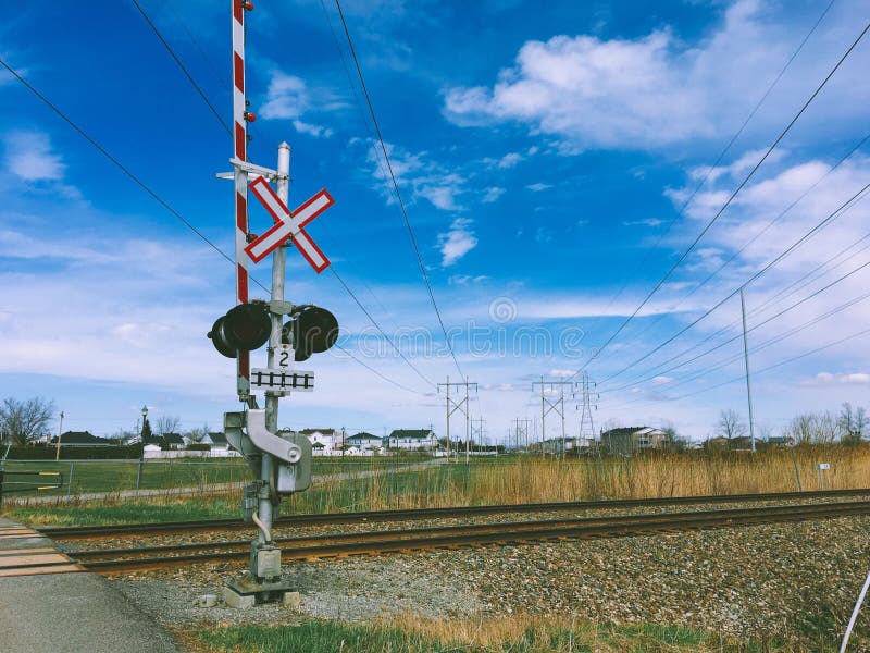 Cross Sign Railway Crossing and Traffic Light Stock Photo - Image of ...