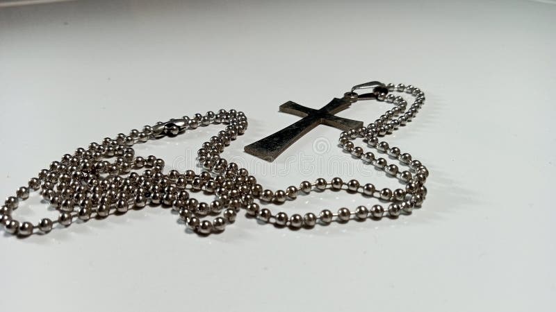 A Cross from Stainles Steel Stock Image - Image of chain, font: 265839173
