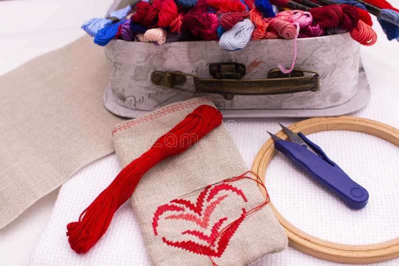 Cross stitch, red color stock photo. Image of blue, close - 146548252