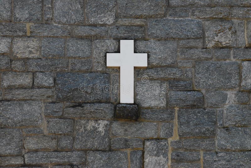 Cross in stone wall stock image. Image of jesus, stone - 1439605