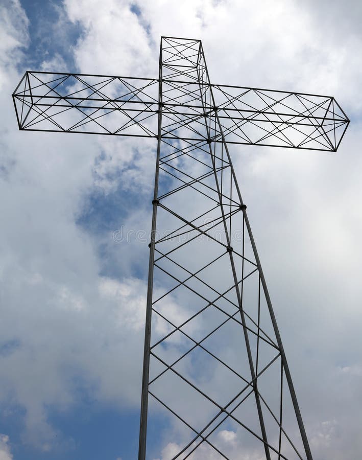 Cross in Vertical and White Clouds on the Sky Stock Photo - Image of ...
