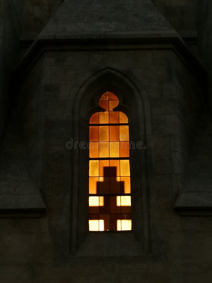 A cross in a window. stock image. Image of night, glass - 134854305