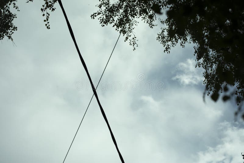 A Cross of Wires in the Sky. Background Intersection of Stretched ...