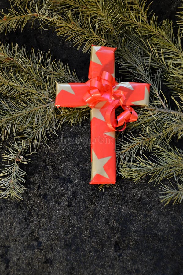 Cross Wrapped in Paper As a Present for Christmas Stock Photo - Image ...