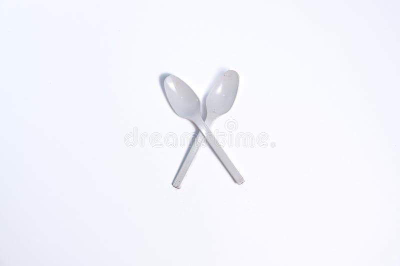 Crossed Plastic Spoons stock photo. Image of cutlery - 365139848