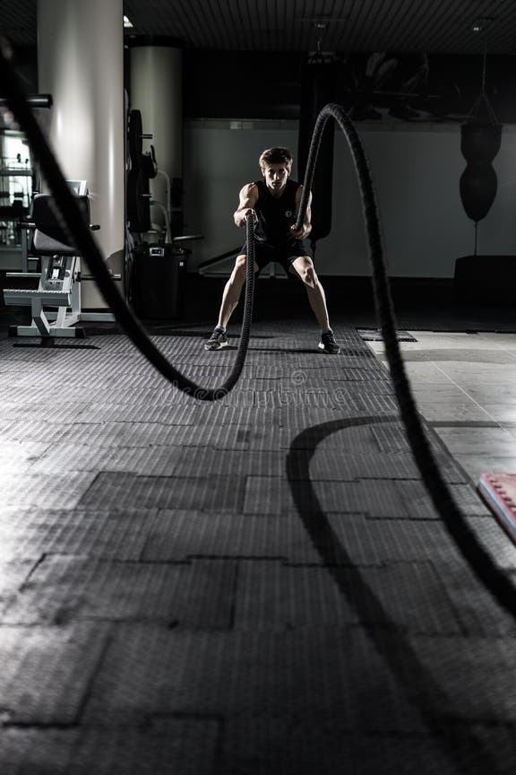 Crossfit Battling Ropes at Gym Workout Exercise. Crossfit Stock Image ...