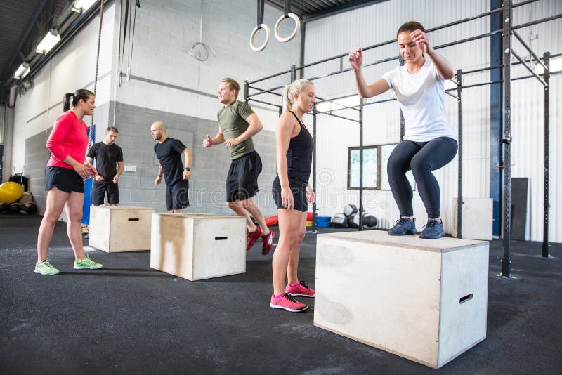 Crossfit Group Trains Box Jumps Stock Photo - Image of competition ...