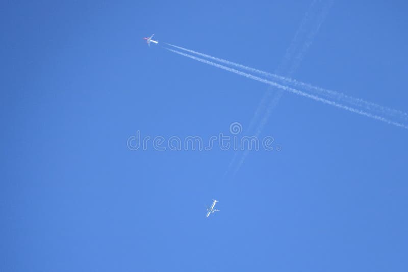 Crossing Airplanes at the Blue Sky Stock Image - Image of crossing ...