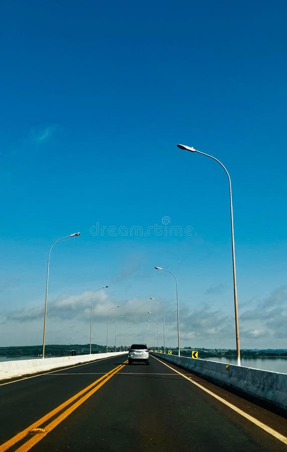 Crossing the Bridge in a Blue Sky Stock Photo - Image of carro, travel ...