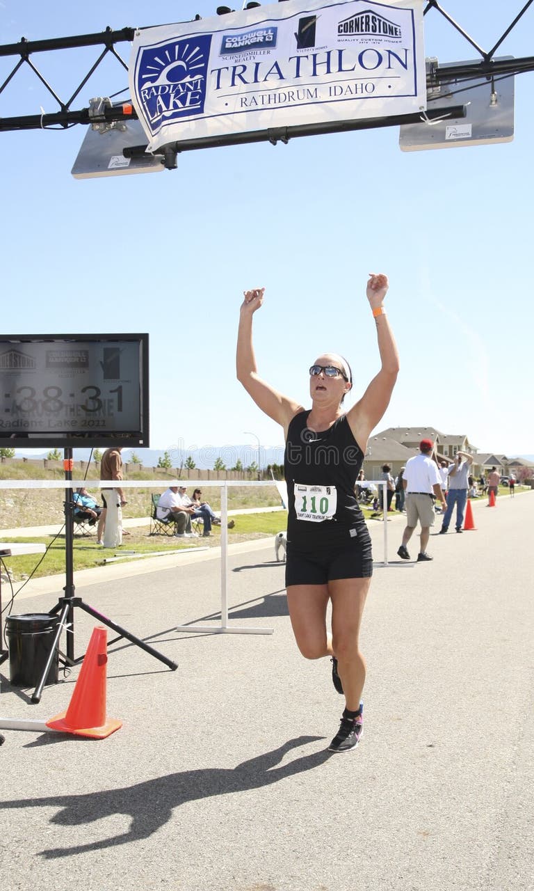 756 Woman Runner Crossing Finish Line Stock Photos - Free & Royalty ...