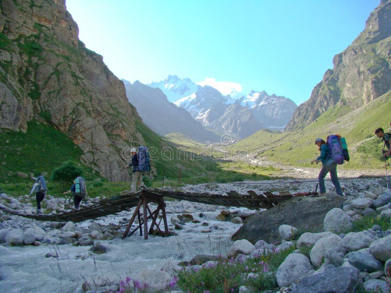 Crossing the river stock image. Image of mountaineer - 79777227