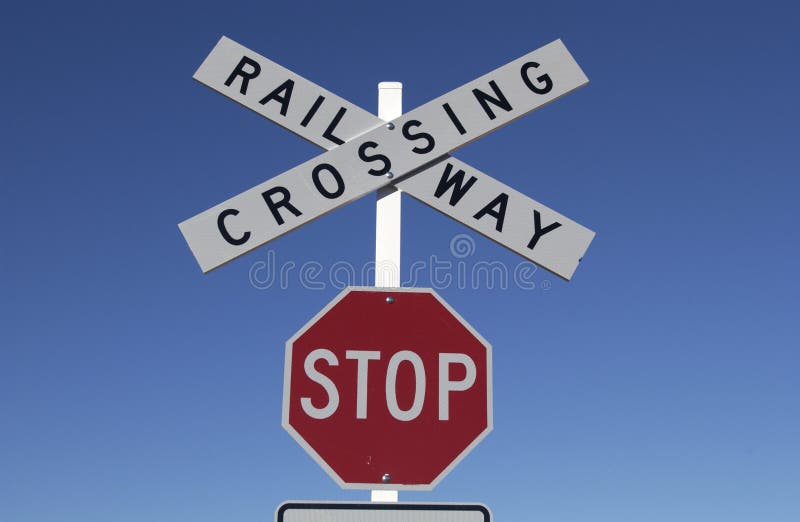A Rail Crossing Stop Sign on Spanish Railway Lines Stock Photo - Image ...