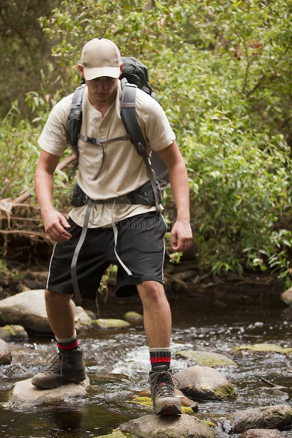 Hiking | Crossing a Stream stock image. Image of rocks - 5182377