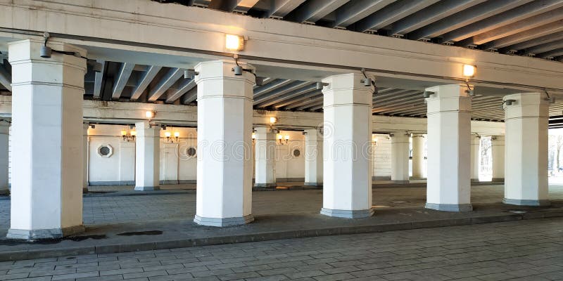 Crossing Under the Bridge with Columns. Stock Image - Image of road ...