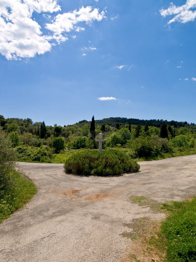 Crossroads stock image. Image of blue, grass, clouds, crossing - 5242379