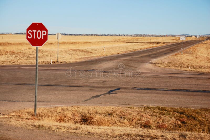 Crossroads (Stop sign) stock image. Image of shadow, direction - 8316851