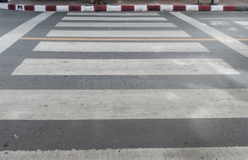 Crosswalk on asphalt road stock photo. Image of symbol - 74729856