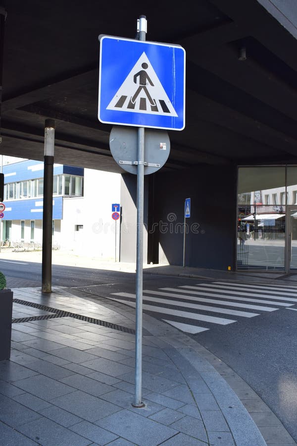 Crosswalk under a bridge stock image. Image of urban - 336339119