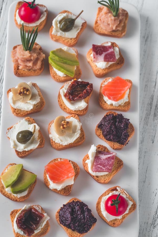 Crostini with Different Toppings Stock Photo - Image of ricotta ...
