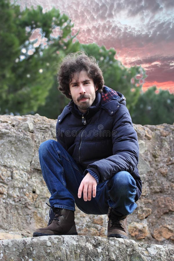 Crouch down man stock image. Image of cloudscape, achievement - 51668491