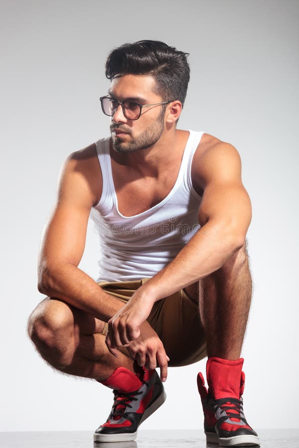 In Crouched Pose, Hands Together Stock Photo - Image of breakdancing ...