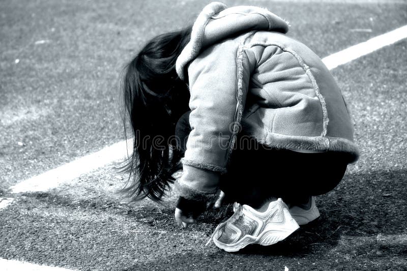 Crouching Girl stock image. Image of street, brunette, girl - 94991