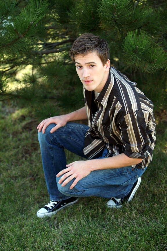 Crouching guy stock image. Image of face, real, caucasian - 12001735