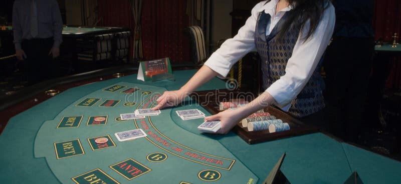 Croupier Handling Cards at Poker Table Stock Image - Image of formal ...