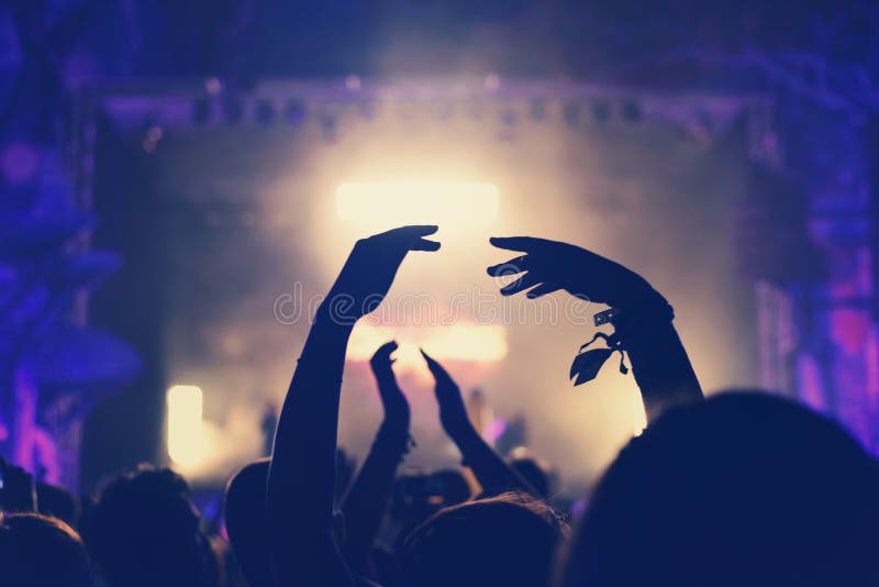 Crowd with Arms Outstretched at Concert Stock Photo - Image of audience ...