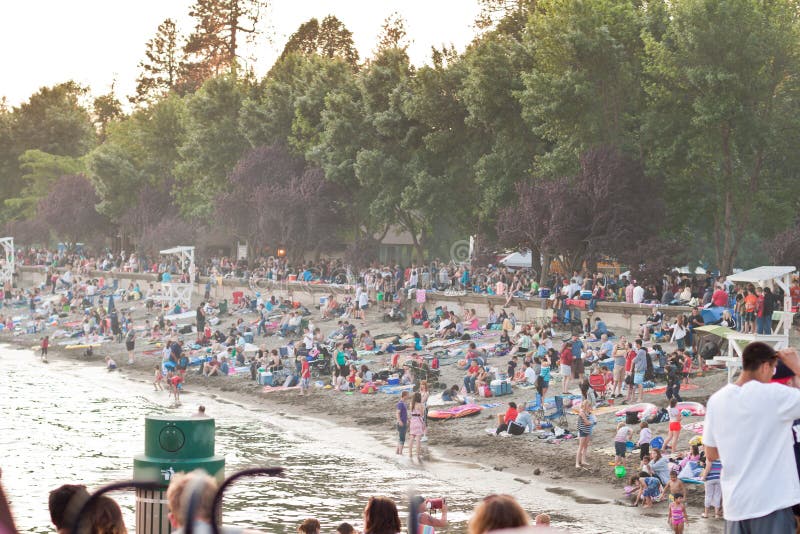 Crowd on the beach editorial photography. Image of celebrating - 25647282