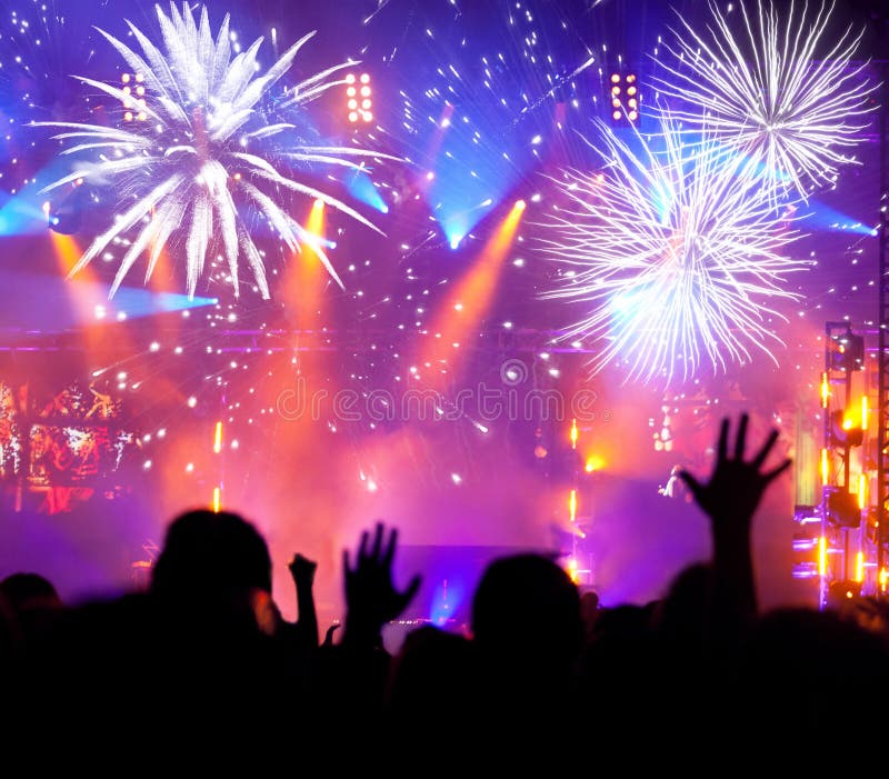 Crowd Celebrating the New Year with Fireworks Stock Image - Image of ...