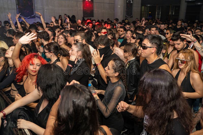 Crowd of Cheerful Young People Having Fun during Techno Party ... Crowd of Cheerful Young People Having Fun during Techno Party ...
