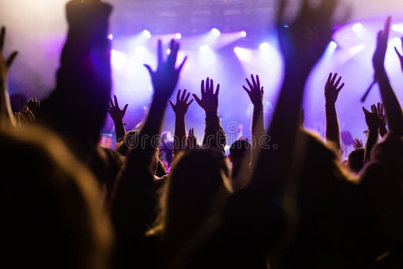 Crowd at Concert and Blurred Stage Lights Stock Image - Image of ...