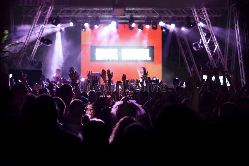 Crowd at Concert and Blurred Stage Lights Stock Photo - Image of party ...
